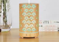 China 200ml Essential Oil Ultrasonic Home Aroma Diffuser Hollow Wood Grain Humidifier 7 LED Lights for sale