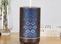 China 200ml Essential Oil Ultrasonic Home Aroma Diffuser Hollow Wood Grain Humidifier 7 LED Lights for sale