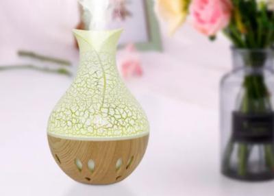 China 130ml Humidifier Oil Diffuser Ultrasonic Aroma Diffuser Wood Grain Mini Humidifier for sale