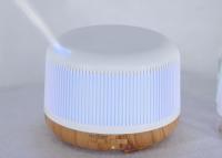 China Hollow Wood Aroma Diffuser 300ml Wood Grain Cool Mist Essential Oil Diffuser for sale