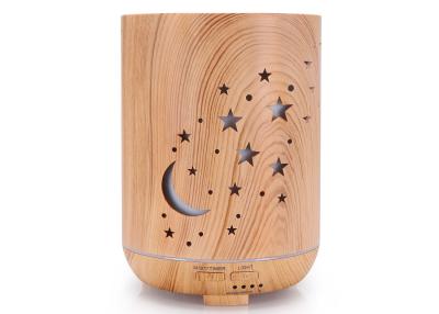 China Hollow Star Moon Design Wood Essential Oil Cool Mist Air Scent Diffuser Machine for sale