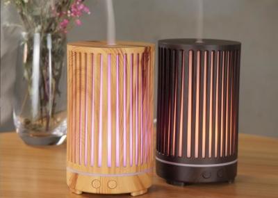 China Household Colorful Hollow Wood Grain Humidifier 200ML Silent Diffuser Machine Ultrasonic Atomizer for sale