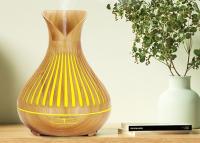China 400ml Essential Oil Aroma Humidifier Vase Mini Hollow Wood Grain Aroma Diffuser for sale