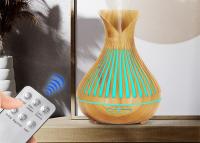 China 400ml Essential Oil Aroma Humidifier Vase Mini Hollow Wood Grain Aroma Diffuser for sale