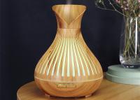 China 400ml Essential Oil Aroma Humidifier Vase Mini Hollow Wood Grain Aroma Diffuser for sale