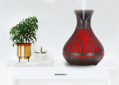 China 400ml Essential Oil Aroma Humidifier Vase Mini Hollow Wood Grain Aroma Diffuser for sale