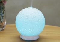 China 100Ml Ceramic Ultrasonic Silent Moon Shape Cool Mist Essential Oil Diffuser Humidifier for sale