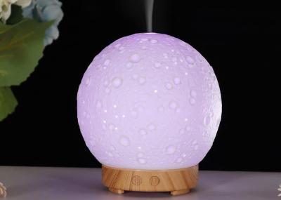 China 100Ml Ceramic Ultrasonic Silent Moon Shape Cool Mist Essential Oil Diffuser Humidifier for sale