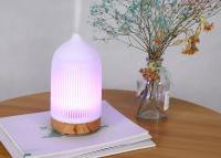 China Small Woodgrain Home Aroma Diffuser Ultrasonic Air Humidifier With LED Lamp for sale