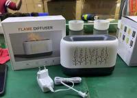 China 200ml Wood Grain Aromatherapy Machine Hollowed Lavender Flame Diffuser Humidifier for sale