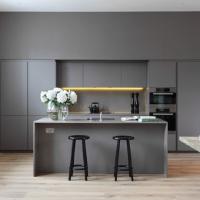 China Waterproof L Shape Kitchen Cabinet Set with Modern Design and Quartz Stone Countertop for sale