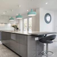 China Veneer Finished Top and Lacquer Finished Bottom Kitchen Cabinet in Glossy Gray Polymer for sale