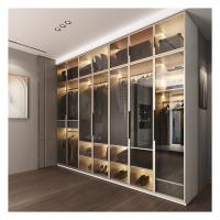 China Adjustable Height Elegant White Aluminium Framed Glass Door Panel Solid Wood Wardrobe for sale