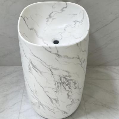 China ODM White Oval Bathroom Pedestal Basin Artificial Stone Solid Surface Freestanding Sink for sale