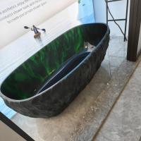 China Luxury Volcanic Stone Solid Surface Bathtub Green Resin Freestanding Soaker 60 Inch for sale