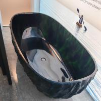 China Luxury Volcanic Stone Solid Surface Bathtub Green Resin Freestanding Soaker 60 Inch for sale