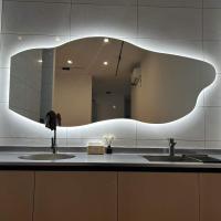 China Personalized Irregular Demister Led Backlit Mirror Wall Mounted Smart Lighting For Bathroom for sale