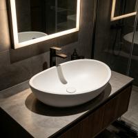China Oval Stone Resin Solid Surface Bathroom Basin Matte Countertop Vessel Sink for sale