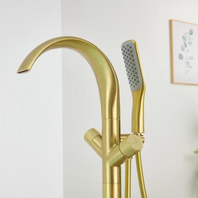 China Modern Brushed Gold Freestanding Waterfall Bathtub Faucet with Handheld Shower bath sanitary ware for sale