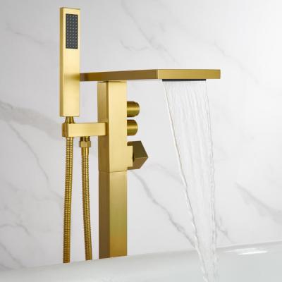 China Modern Brushed Gold Freestanding Bathtub Faucet Solid Brass Waterfall Tub Filler with Handheld Shower bath sanitary ware for sale