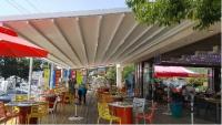 China Modern Design Bioclimatic Motorized Aluminium Retractable PVC Pergola for sale