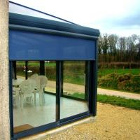 China Integrated Windproof Roller Blinds Facade Sunshade Motorized Roller Shades for sale