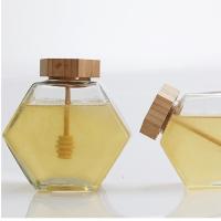 China 100ml 220ml 380ml Clear Glass Honey Hexagon Jar with Wood Cork Lid Food Grade for sale