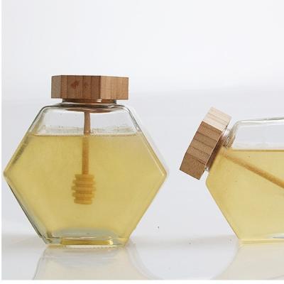 China Hexagonal Clear Glass Honey Jar 100ml 220ml 380ml with Bamboo Lid Eco-Friendly Food Grade for sale