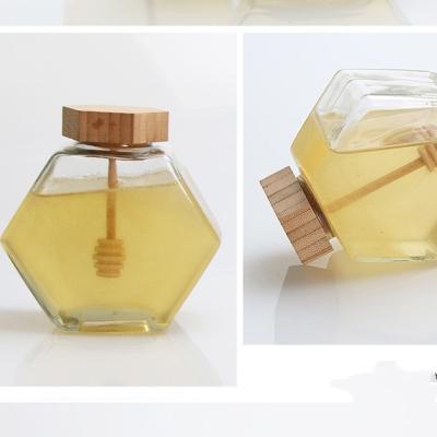 China Wholesale Hexagon Glass Jam Jar 100ML 220ML 380ML with Wood Lid Dipper for Honey Food Storage for sale