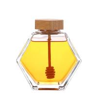 China 100ml 220ml 380ml Clear Glass Honey Hexagon Jar with Wood Cork Lid Food Grade for sale