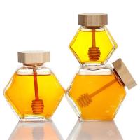 China 100ml 220ml 380ml Clear Glass Honey Hexagon Jar with Wood Cork Lid Food Grade for sale