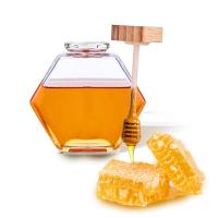 China 100ml 220ml 380ml Clear Glass Honey Hexagon Jar with Wood Cork Lid Food Grade for sale