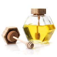 China 100ml 220ml 380ml Clear Glass Honey Hexagon Jar with Wood Cork Lid Food Grade for sale