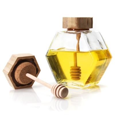 China 100ml 220ml 380ml Clear Glass Honey Hexagon Jar with Wood Cork Lid Food Grade for sale