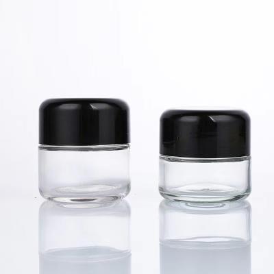 China Airtight Clear Child Resistant Glass Jar 2oz 3oz 4oz 6oz with CR Cap for Flower Packaging for sale