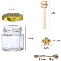 China 45ml 1.5oz Hexagonal Clear Glass Honey Jar with Wood Cork Lid and Bee Gift Packaging for sale