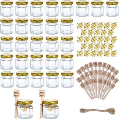 China 45ml Hexagonal Glass Honey Jar with Wood Cork Lid Eco Friendly Food Grade Clear Glass Jar for Honey Jam Spice for sale