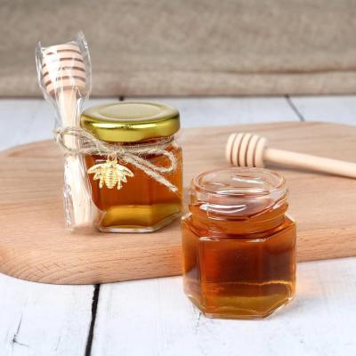 China 45ml 1.5oz Hexagonal Clear Glass Honey Jar with Wood Cork Lid and Bee Gift Packaging for sale