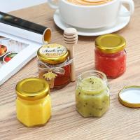 China 45ml 1.5oz Hexagonal Clear Glass Honey Jar with Wood Cork Lid and Bee Gift Packaging for sale