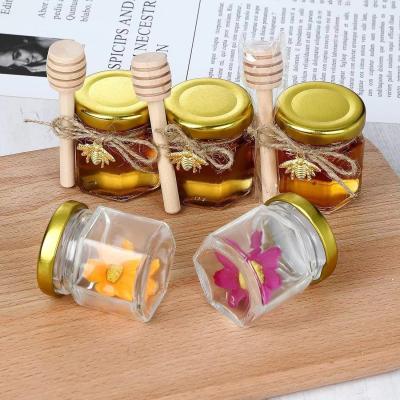 China Custom 45ml Hexagonal Clear Glass Honey Jar with Wood Cork Lid and Dipper for Spice Party Gift Jam Jelly for sale