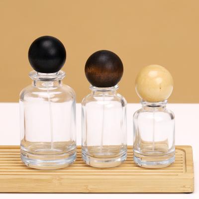 China 30ml 50ml 100ml Round Glass Perfume Bottle with Box Empty Luxury Atomizer Spray Bottle for sale
