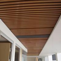 China Suspended Wood Grain Aluminum Baffle Ceiling 30x100mm Fireproof for Mall Hotel for sale