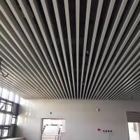 China Suspended Wood Grain Aluminum Baffle Ceiling 30x100mm Fireproof for Mall Hotel for sale
