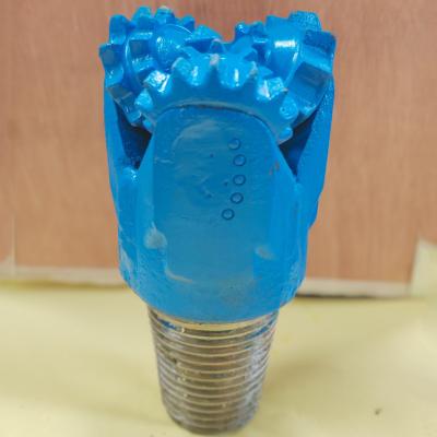 China Three Cones Carbide Milled Tooth Drill Bit For Rotary Drilling for sale