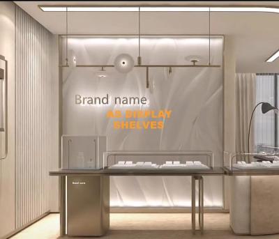 China Curved Commercial Jewellery Display Cases Stainless Steel Golden Style for sale
