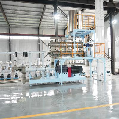 China Twin-screw wet Fish Food Extruder Floating Tilapia Fish Feed Drying Equipment Grinder Blender and Flavoring System for sale