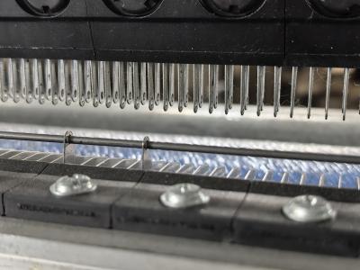 China The Guide Bar System: Ensuring Accurate Yarn Guidance in Warp Knitting Machines for sale