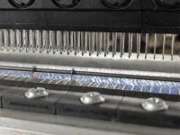 China Understanding the Role of Guide Bars in Warp Knitting Machines for sale