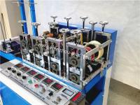 China Double Layers PE Plastic Shoe Cover Making Machine 100-120 Pcs/Min for sale