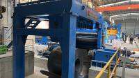China 35KG Weight Steel Structure Levelling Machine for Flattening and Rewinding Steel Coils for sale